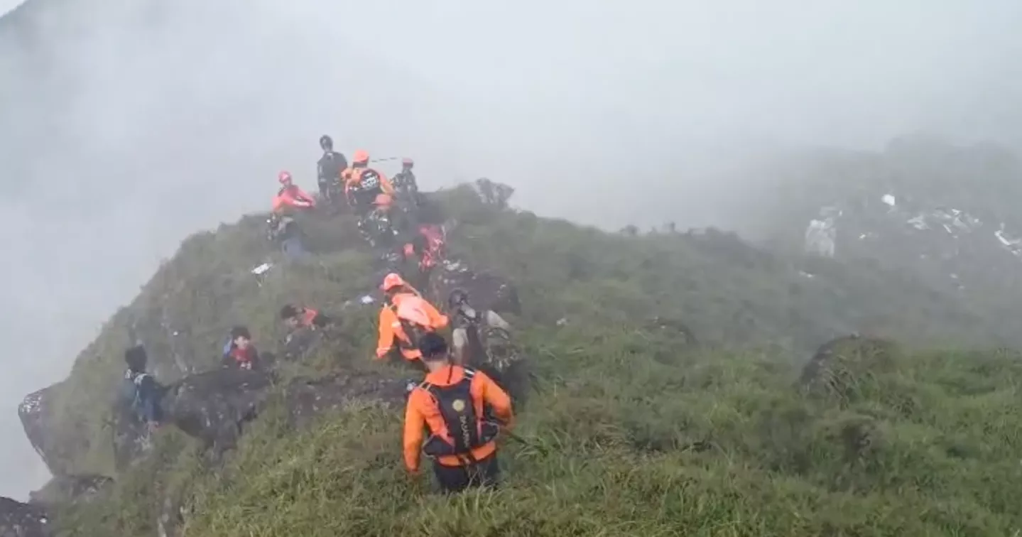 Indonesian rescuers find body near wreckage of a plane that crashed ...